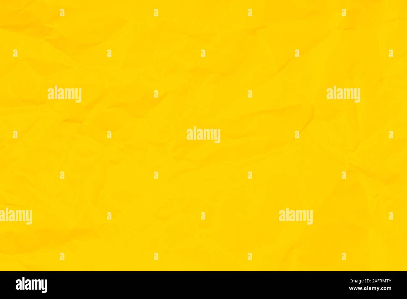 Closeup yellow crumpled paper texture background Stock Photo - Alamy