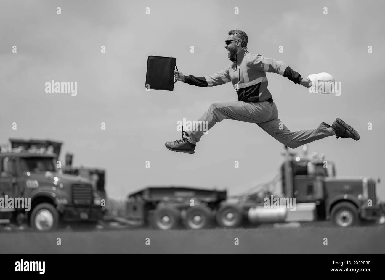 Hispanic 40 s builder excited jump on site construction. Excited ...