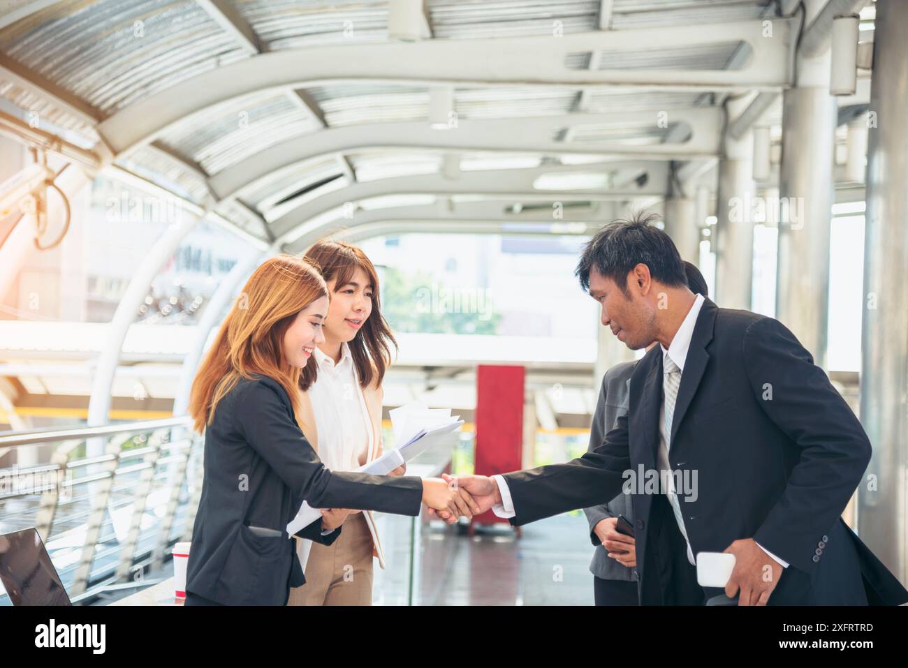 Team Business Partners shaking hands together to Greeting Start up new ...