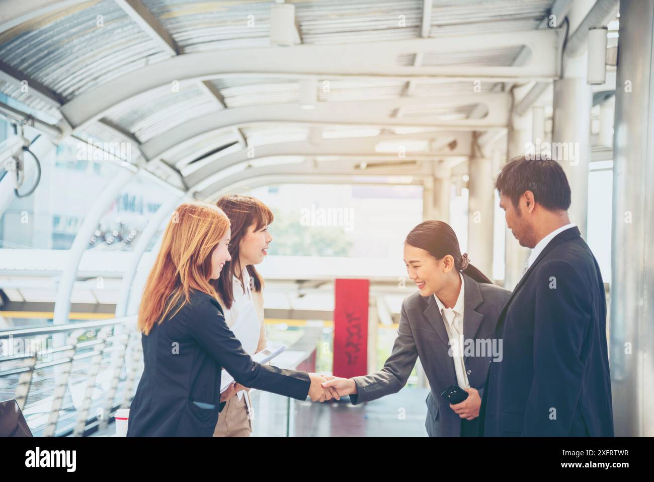 Team Business Partners shaking hands together to Greeting Start up new ...