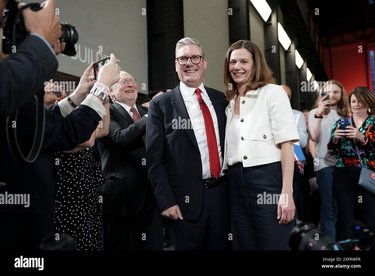 Labour leader Sir Keir Starmer and his wife Victoria are greeted by ...