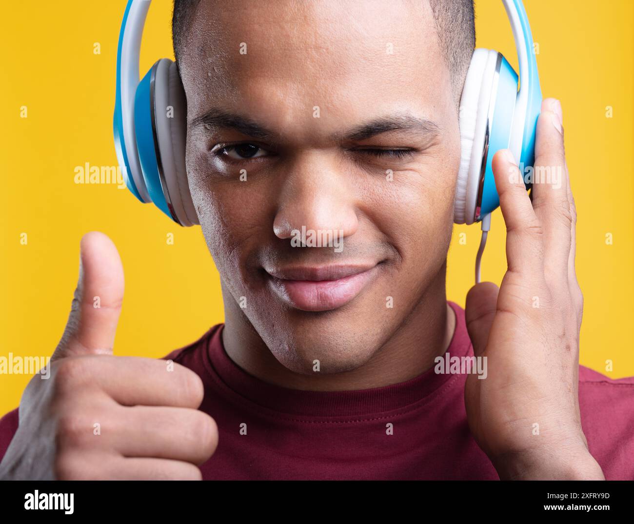 Young guy wearing headphones enjoys hi-res stock photography and images - Alamy