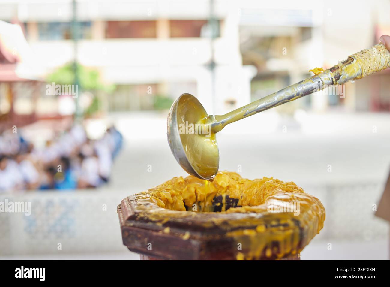 Candle melting ceremony for festival Buddhist Stock Photo - Alamy