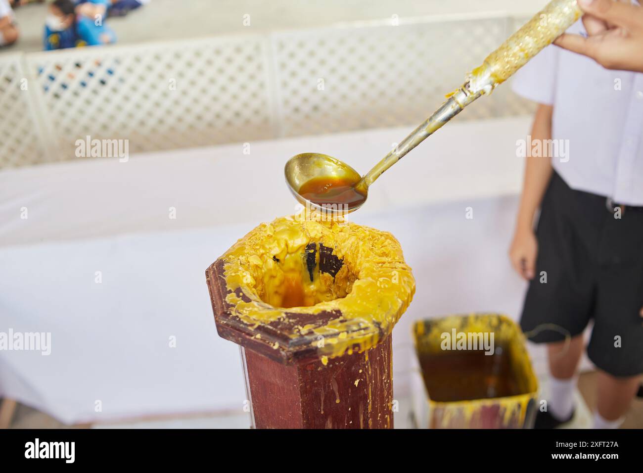Candle melting ceremony for festival Buddhist Stock Photo - Alamy