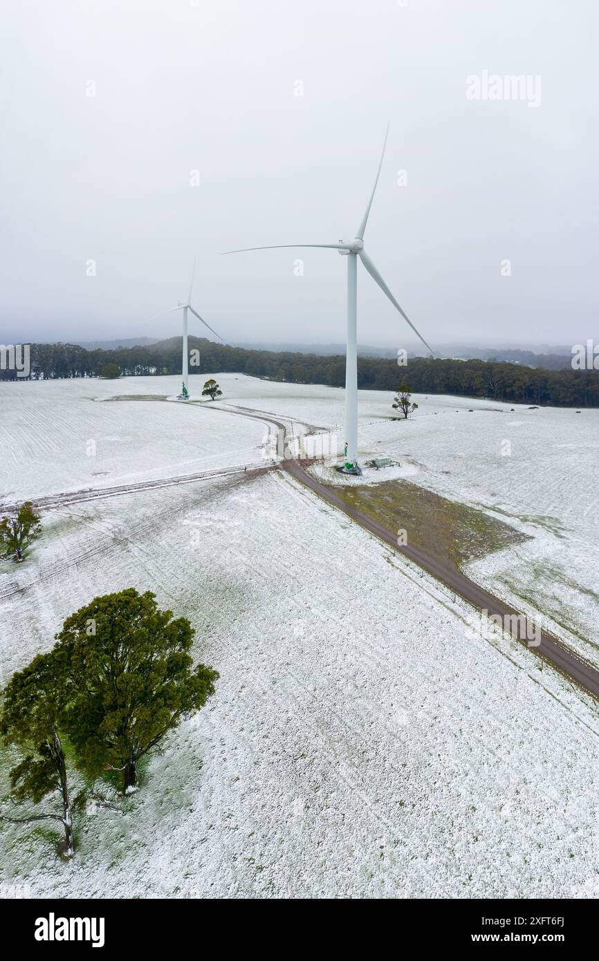 Aerial view of wind turbines ona snow covered hill top at Leonards Hill ...
