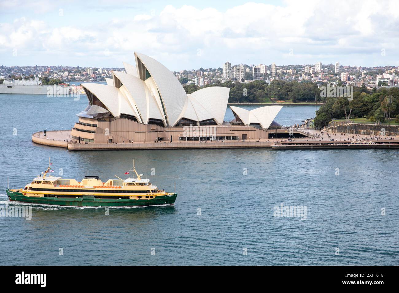 Sydney Opera House with MV Freshwater ferry passing by, Garden Island ...