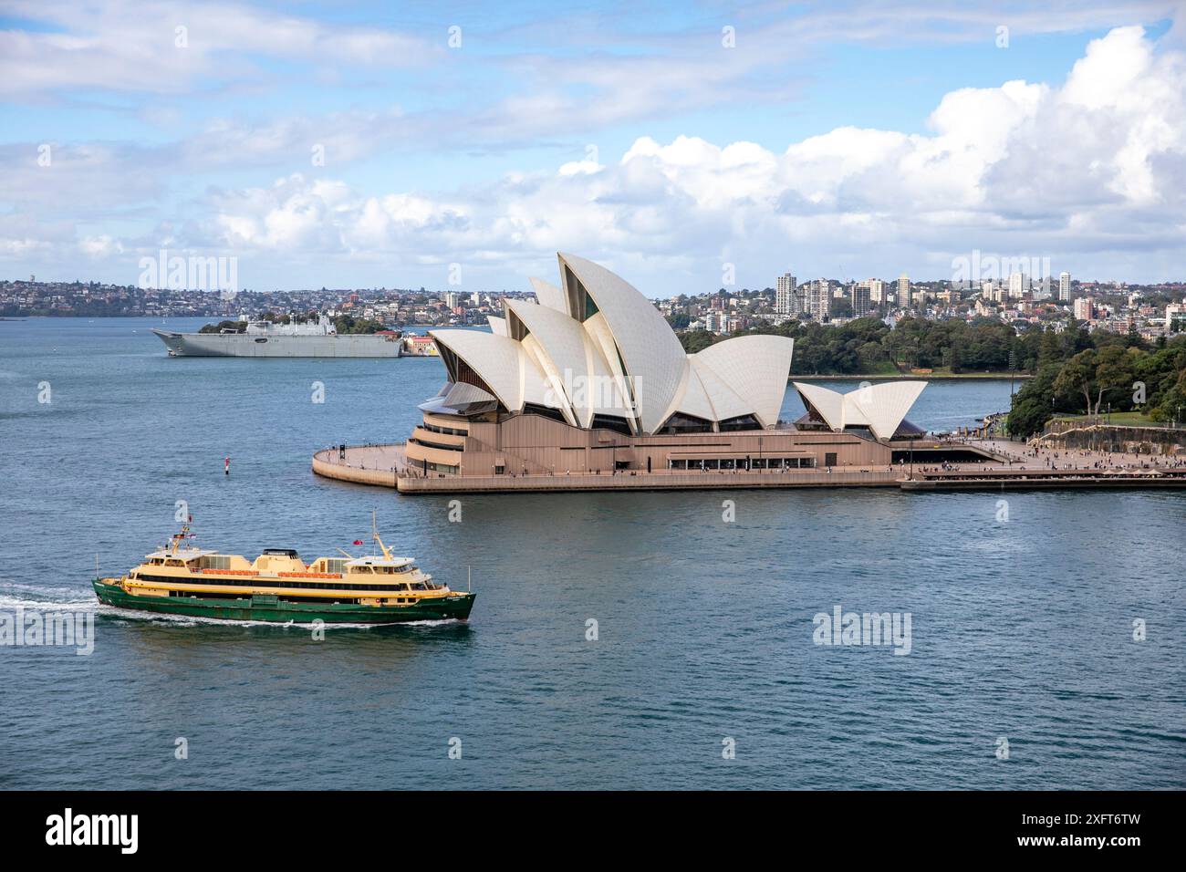 Sydney Opera House with MV Freshwater ferry passing by, Garden Island ...