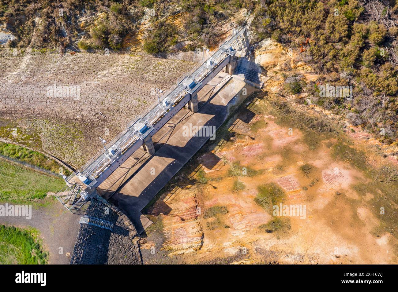 Aerial view of the wier gates of a dry reservoir at Malmsbury in ...