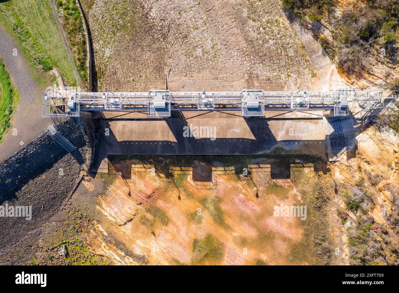 Aerial view of the wier gates of a dry reservoir at Malmsbury in ...