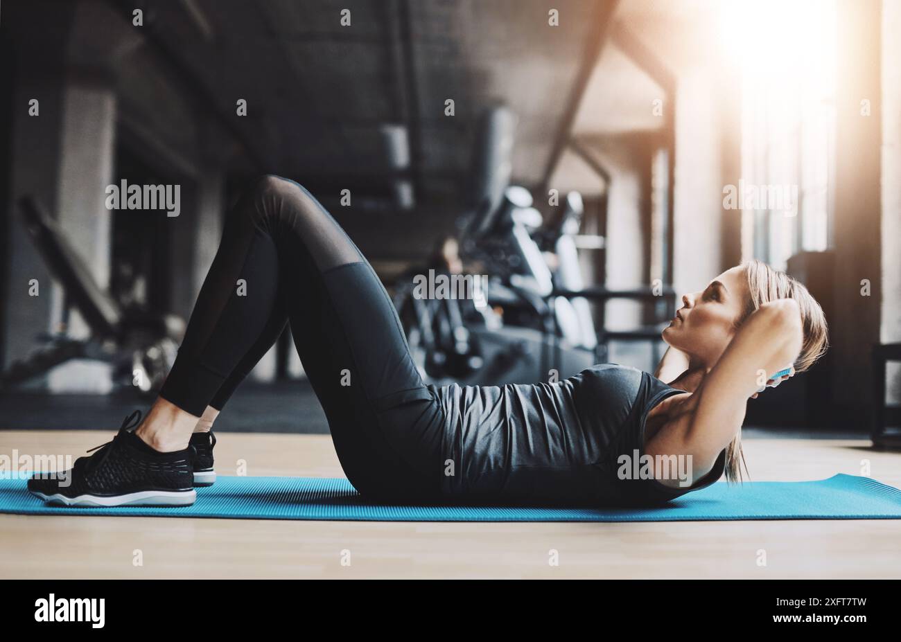 Woman, sit ups and exercise in gym with fitness for muscle mass, core ...