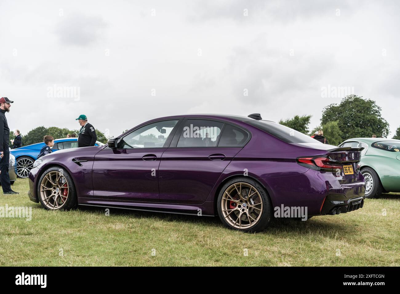 Tarporley, Cheshire, England, June 29th 2024. A purple BMW M5 ...
