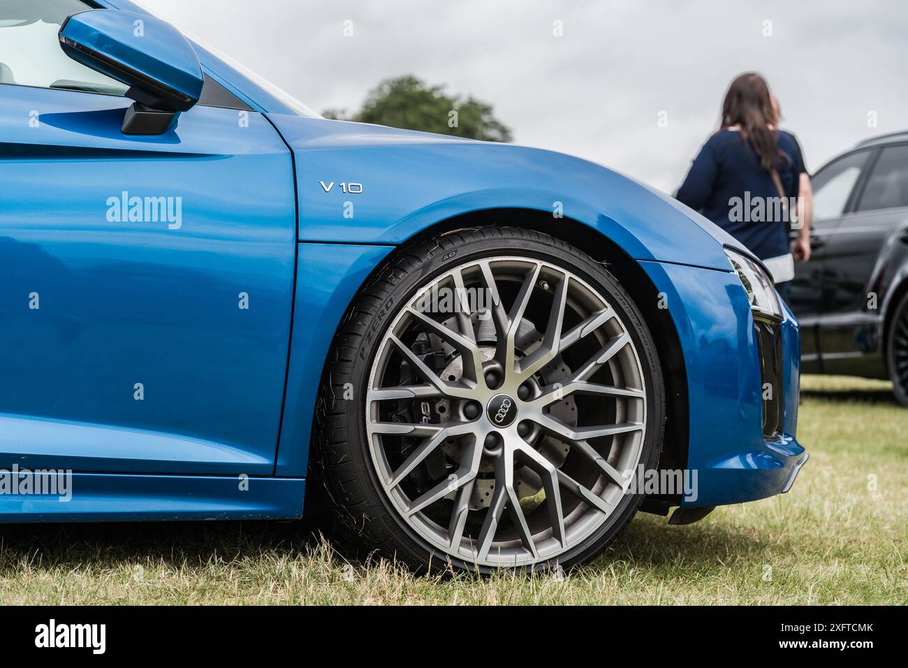 Tarporley, Cheshire, England, June 29th 2024. A close-up of a blue Audi ...