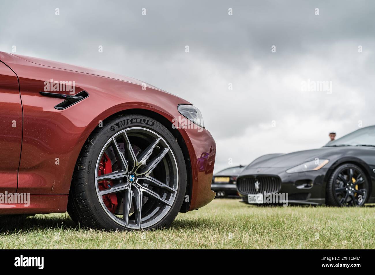 Tarporley, Cheshire, England, June 29th 2024. A close-up of a red BMW ...