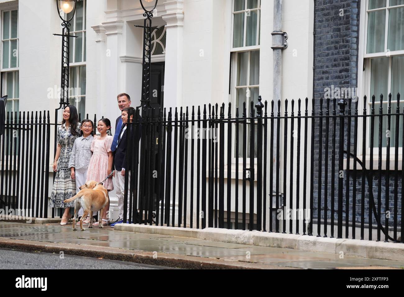 Outgoing Conservative chancellor of the exchequer Jeremy Hunt, with his ...