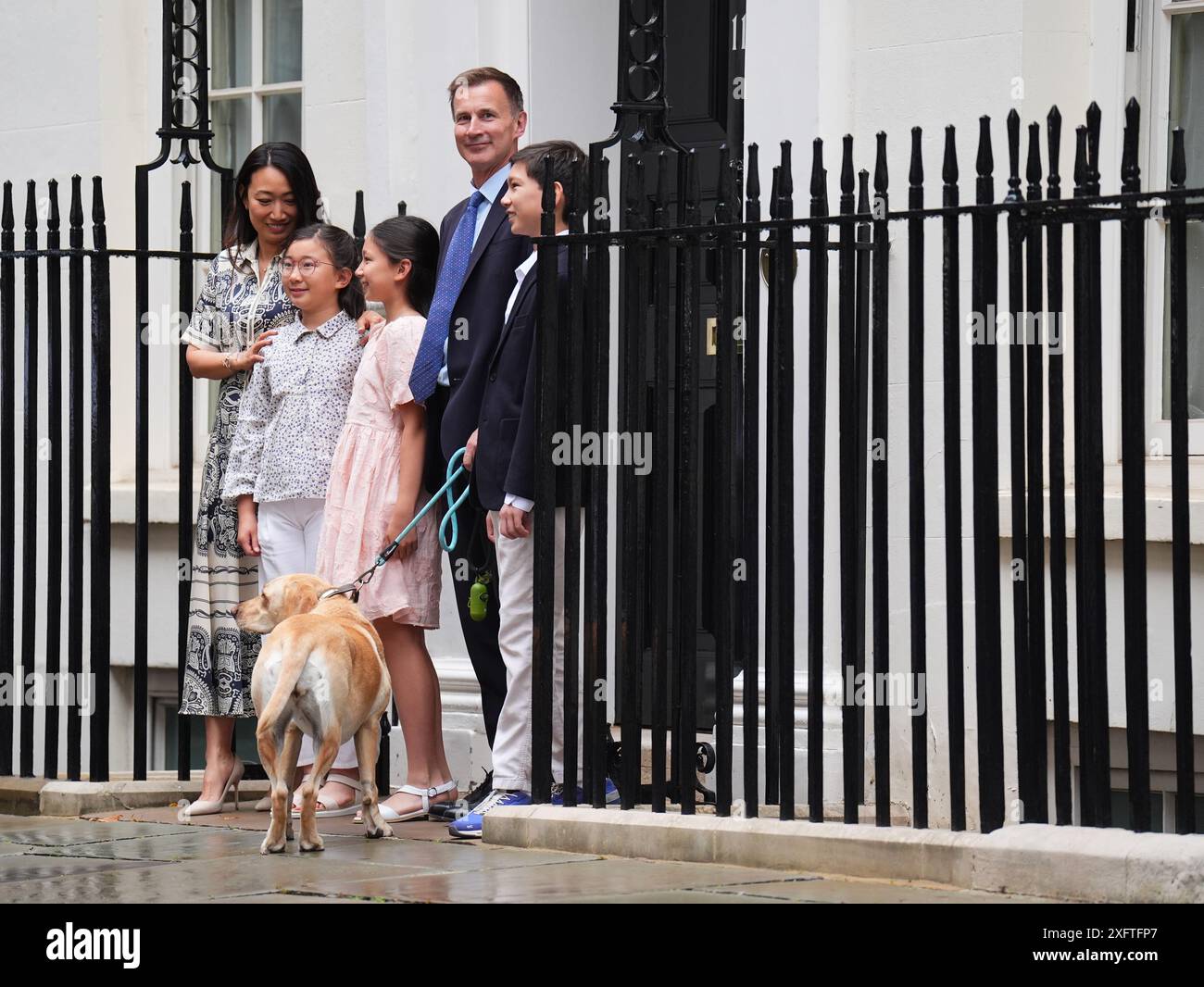 Outgoing Conservative chancellor of the exchequer Jeremy Hunt, with his ...