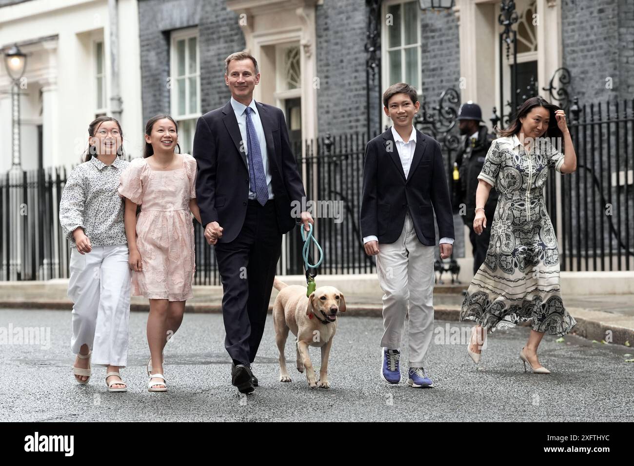 Outgoing Conservative chancellor of the exchequer Jeremy Hunt, with his ...