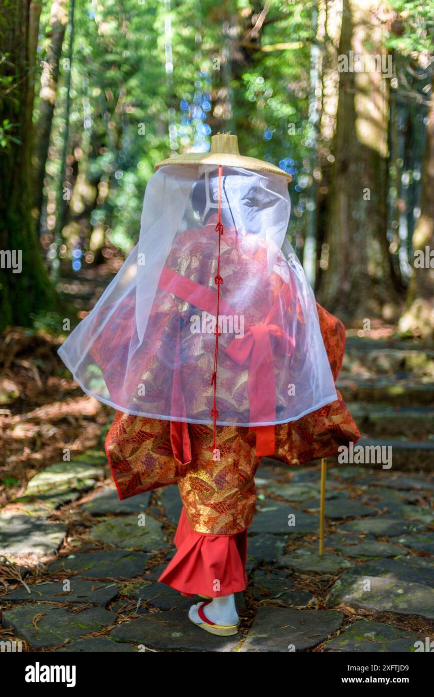Japanese woman wearing traditional Heian Period costume at the Kumano ...