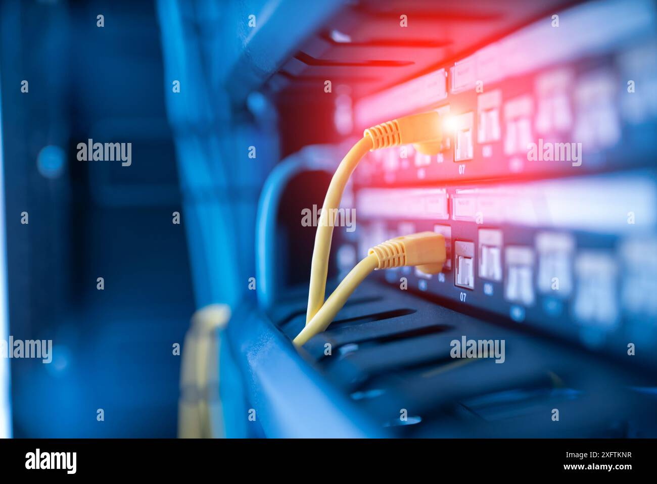 close up of network cables connected to server racks in data center room Stock Photo - Alamy
