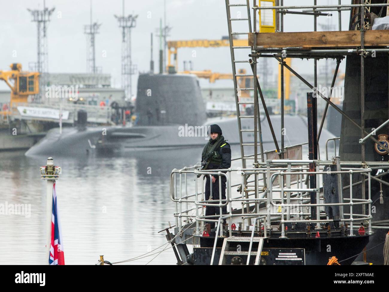 File photo dated 20/01/16 of a member of the armed services on the deck ...