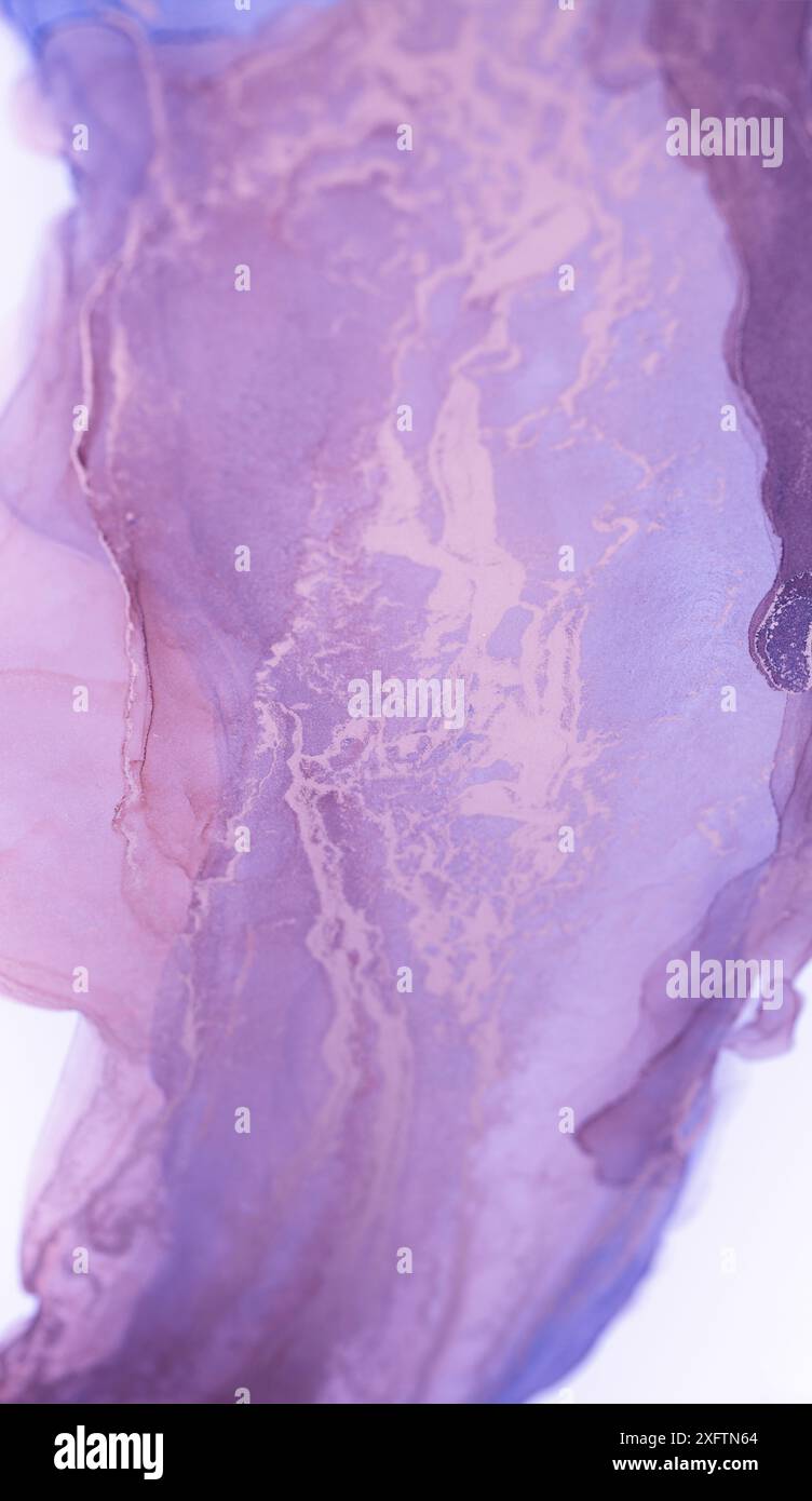 A close-up photograph of a lilac-colored ink swirl, showing delicate ...