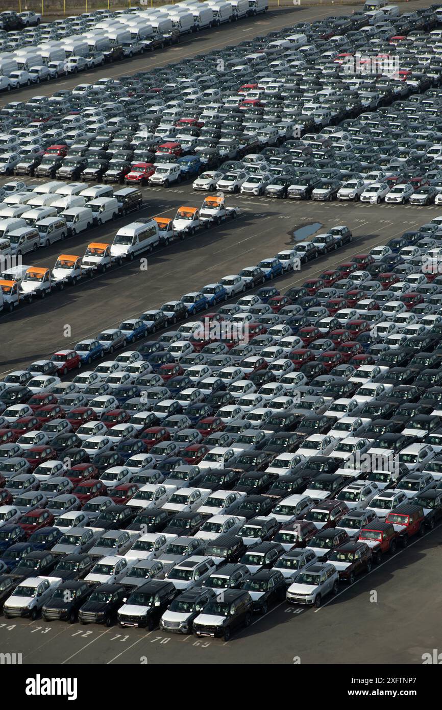 Aerial Top view of new cars lined up in a port in Panama ready for ...