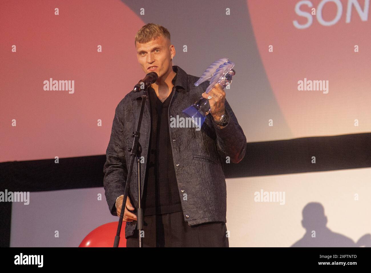 Danish actor Sebastian Bull with Blue Angel award for the best male ...