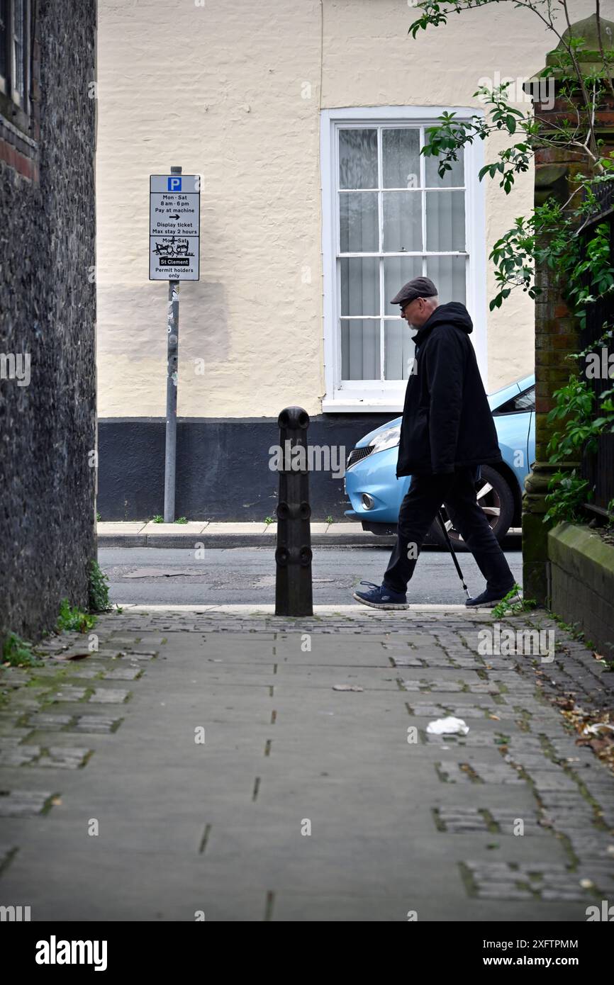 lone man walking norwich norfolk england Stock Photo - Alamy