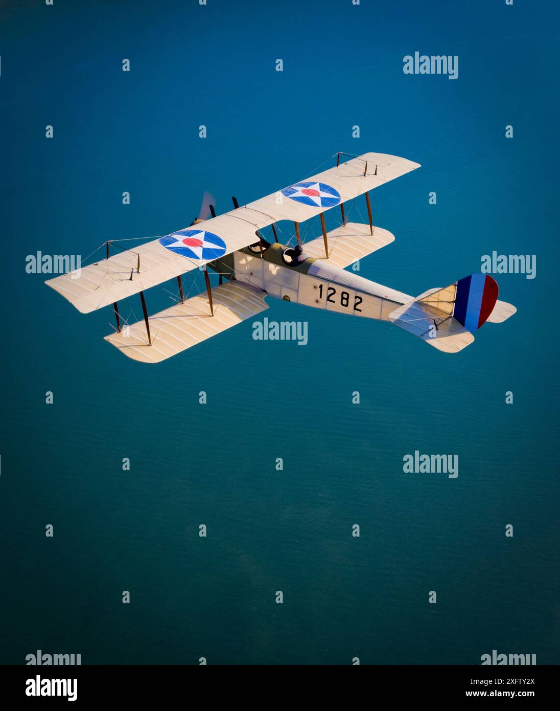 Antique plane flies over the Columbia River Gorge Hood River, Oregon ...