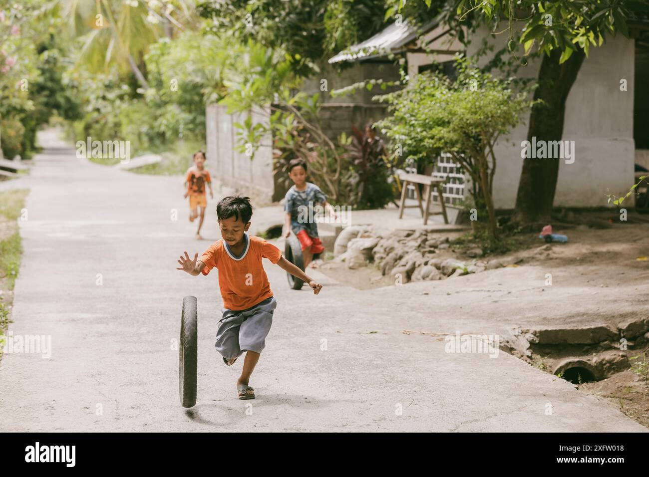 Indonesian kids playing hi-res stock photography and images - Alamy