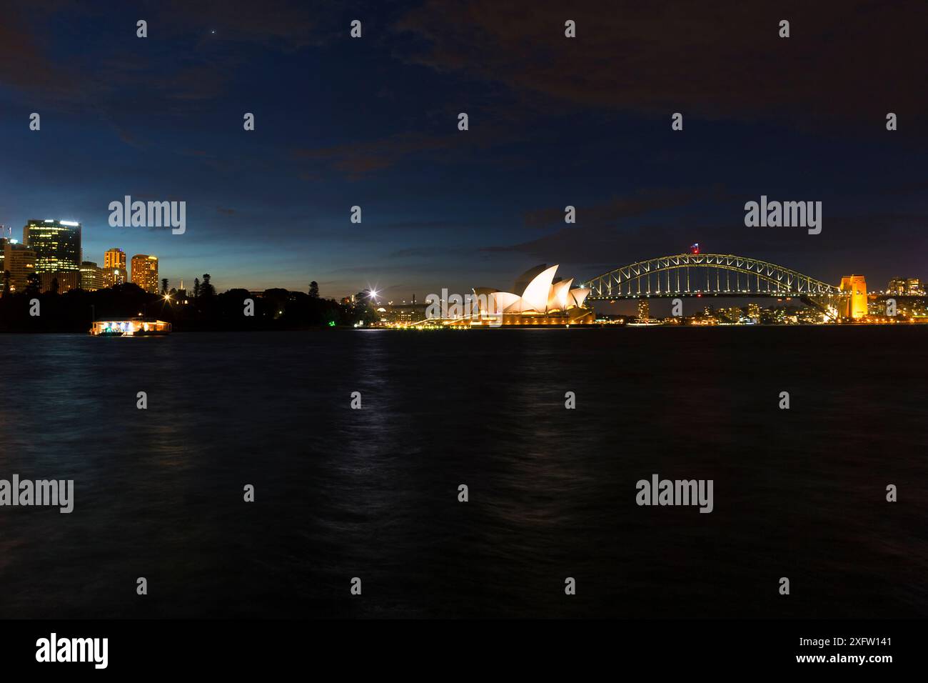 Sydney harbour at night witht the Sydney Opera House and Sydney Harbour ...