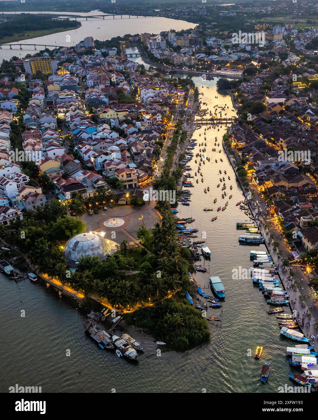 Aerial view of Hoi An Ancient Town with lantern boats on Hoai river, in ...