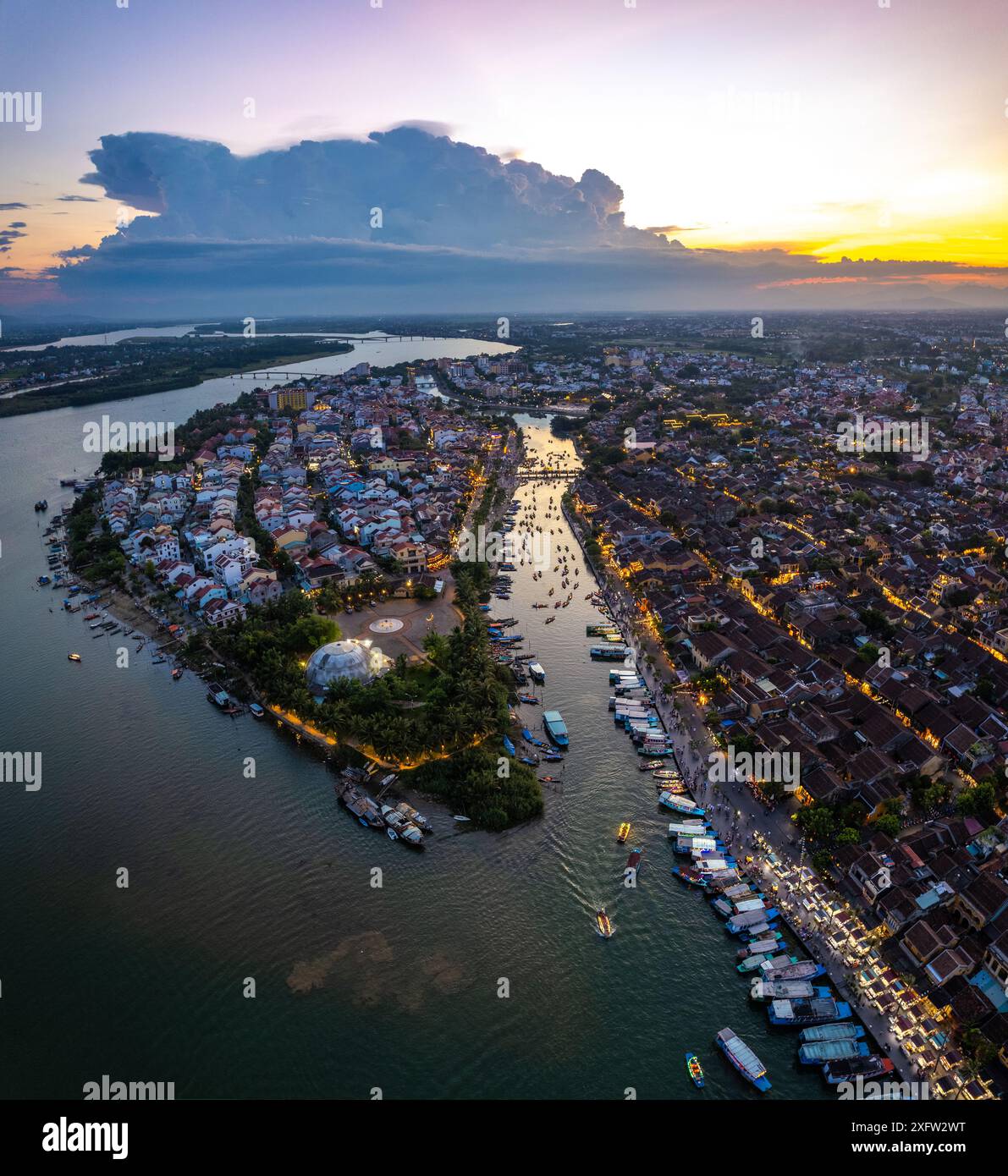 Aerial view of Hoi An Ancient Town with lantern boats on Hoai river, in ...