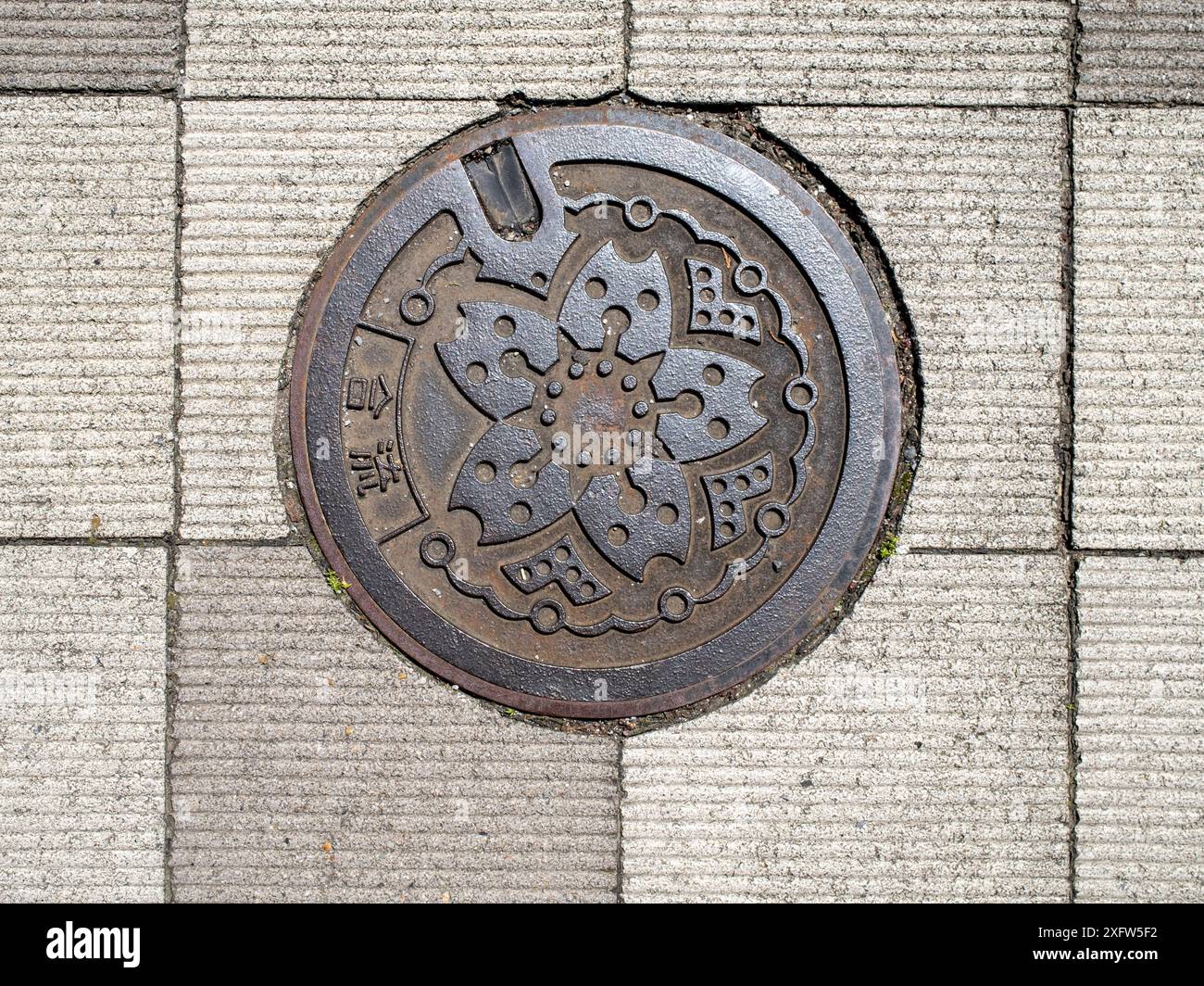Decorative Manhole Cover in Midtown Tokyo Japan Stock Photo - Alamy