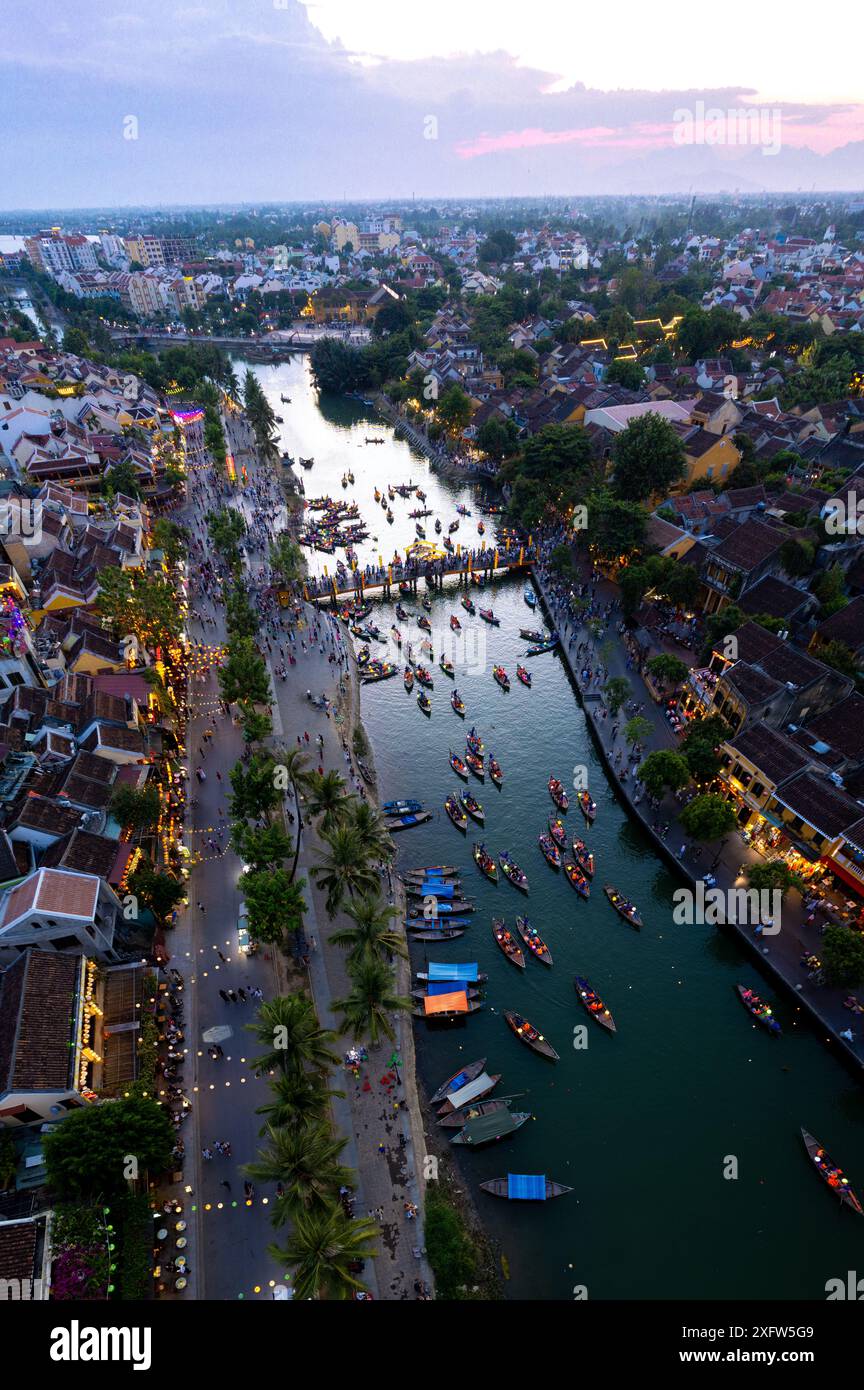 Aerial view of Hoi An Ancient Town with lantern boats on Hoai river, in ...