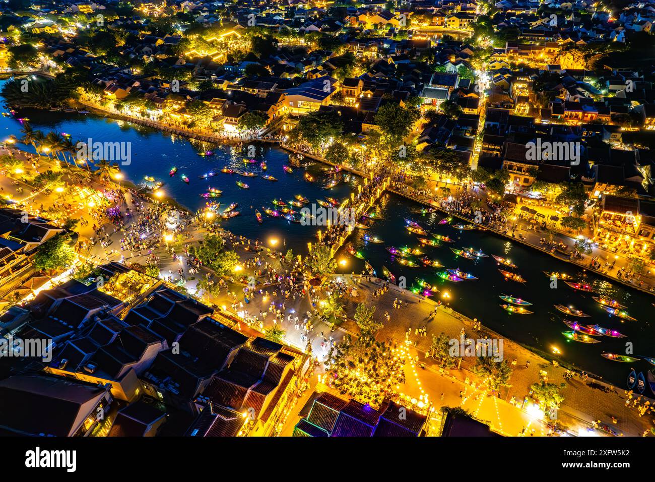 Aerial view of Hoi An Ancient Town with lantern boats on Hoai river, in ...
