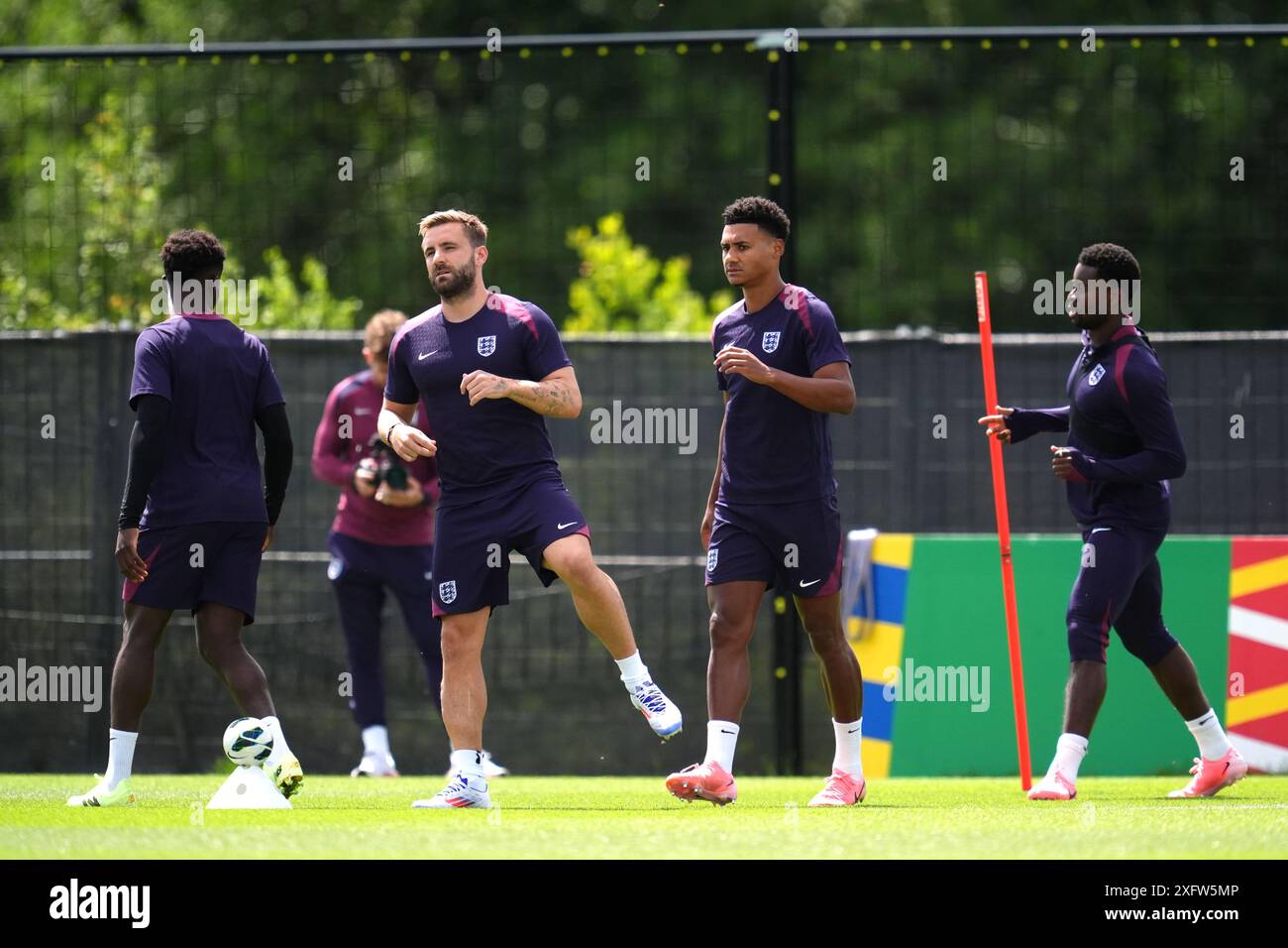 England's Luke Shaw, Ollie Watkins and Marc Guehi at a training session ...