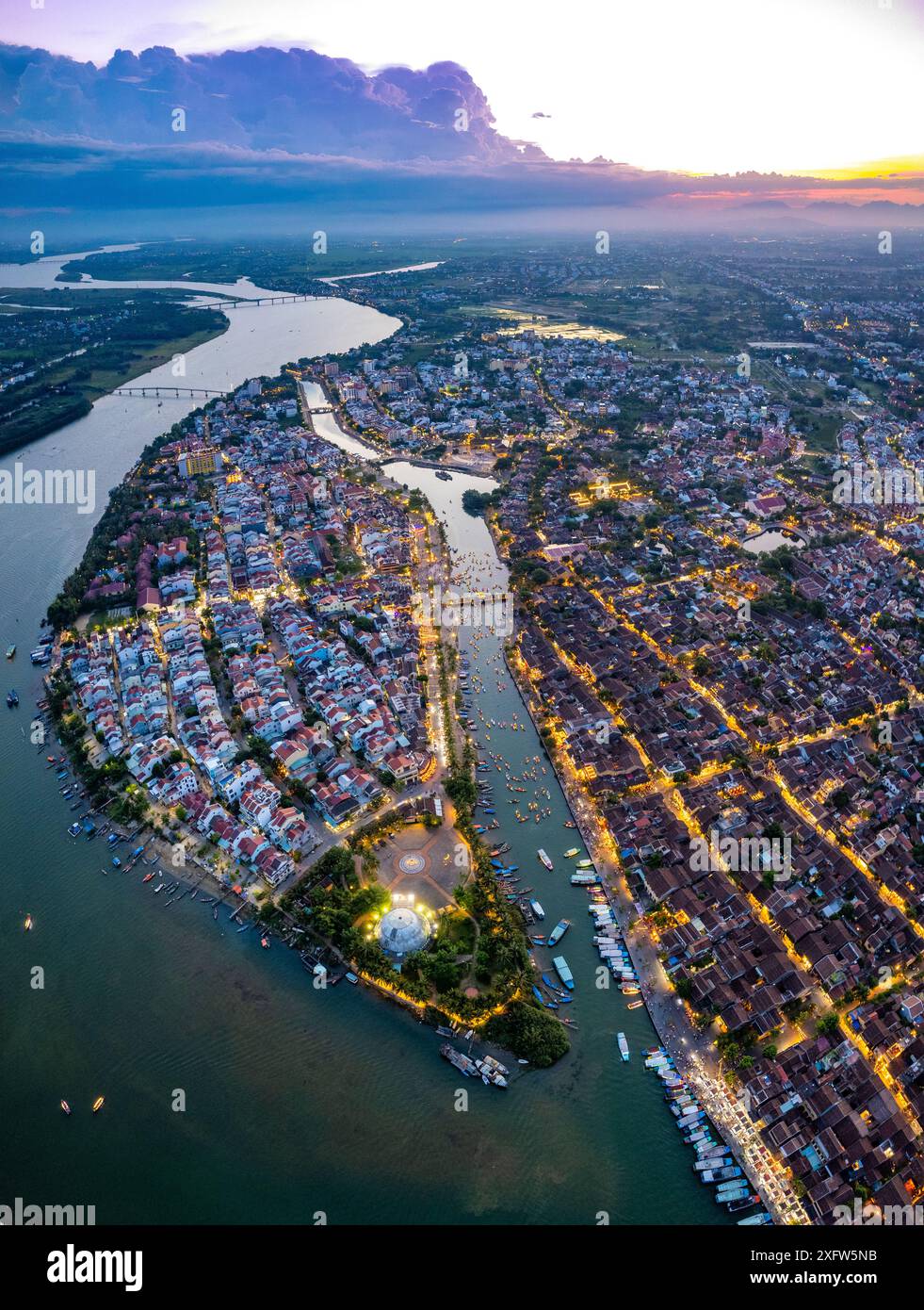 Aerial view of Hoi An Ancient Town with lantern boats on Hoai river, in ...