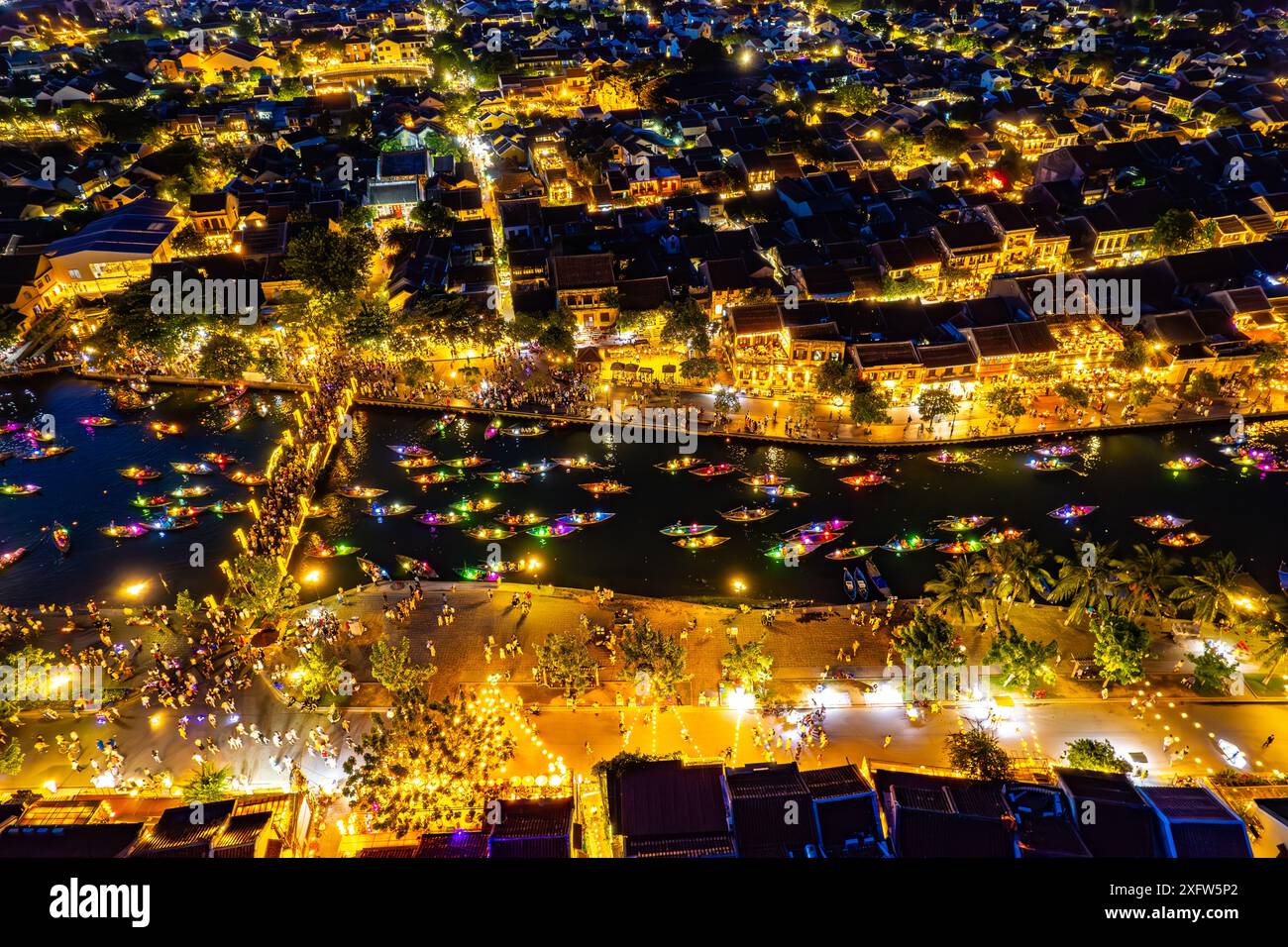 Aerial view of Hoi An Ancient Town with lantern boats on Hoai river, in ...