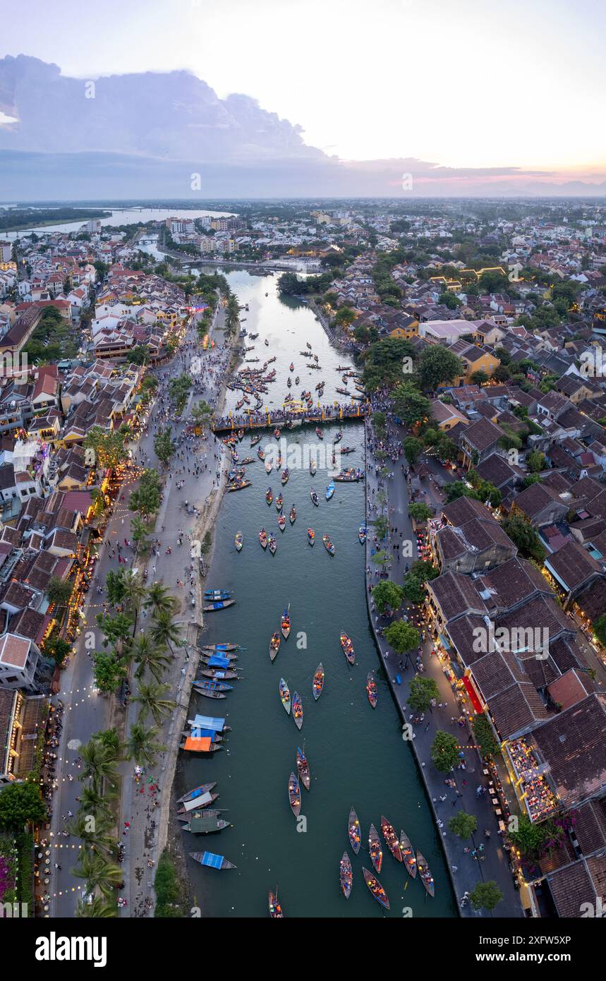 Aerial view of Hoi An Ancient Town with lantern boats on Hoai river, in ...