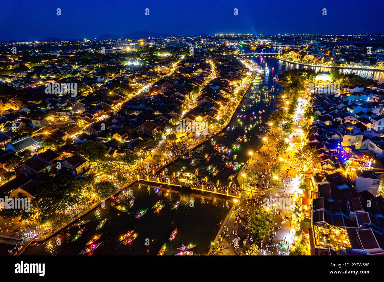 Aerial view of Hoi An Ancient Town with lantern boats on Hoai river, in ...