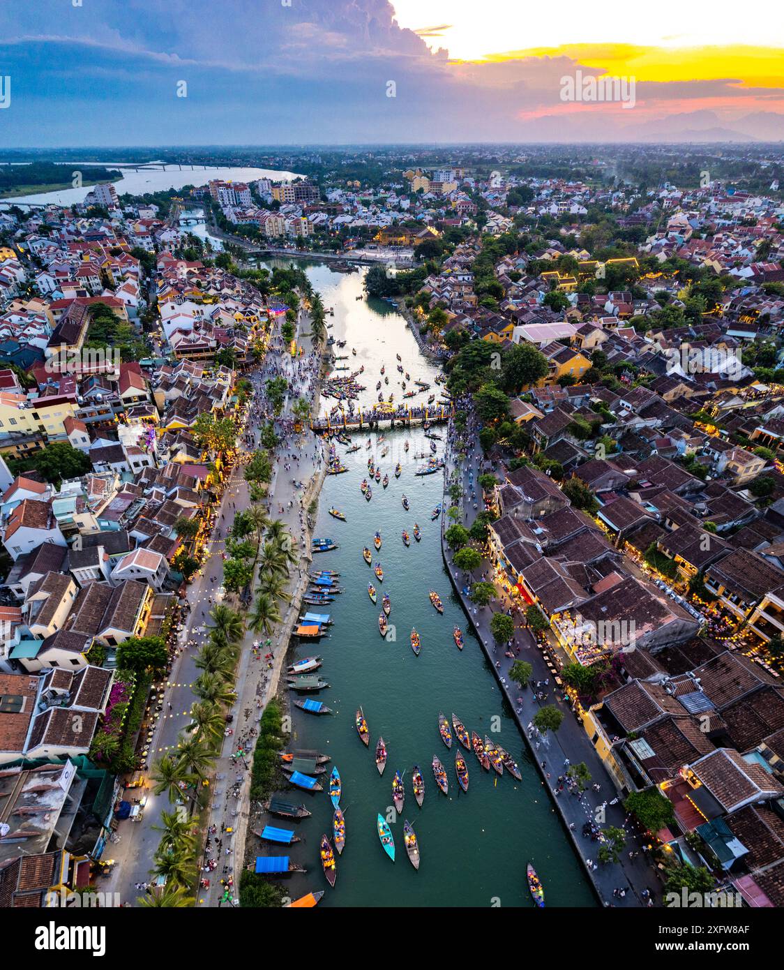 Aerial view of Hoi An Ancient Town with lantern boats on Hoai river, in ...