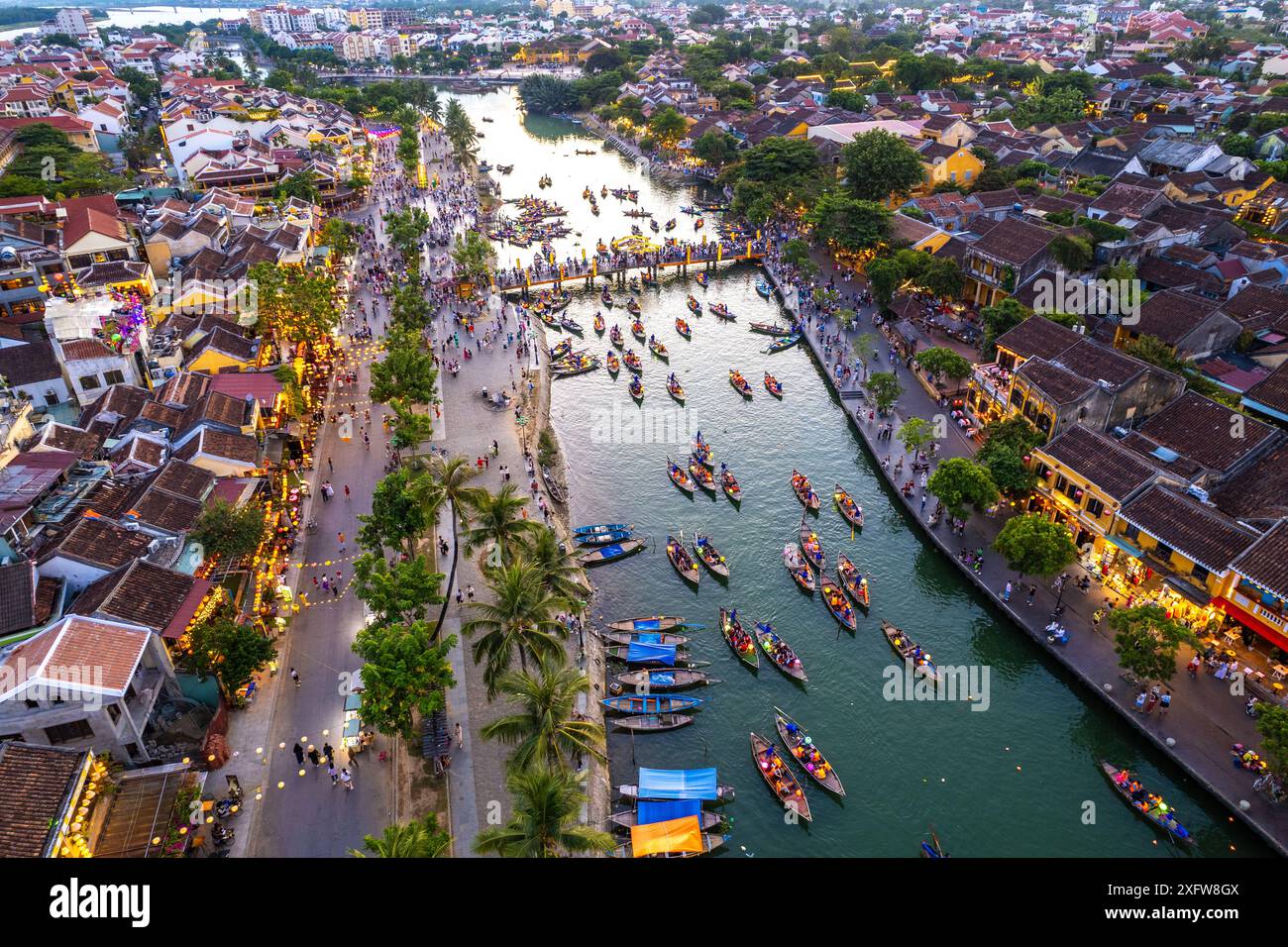 Aerial view of Hoi An Ancient Town with lantern boats on Hoai river, in ...