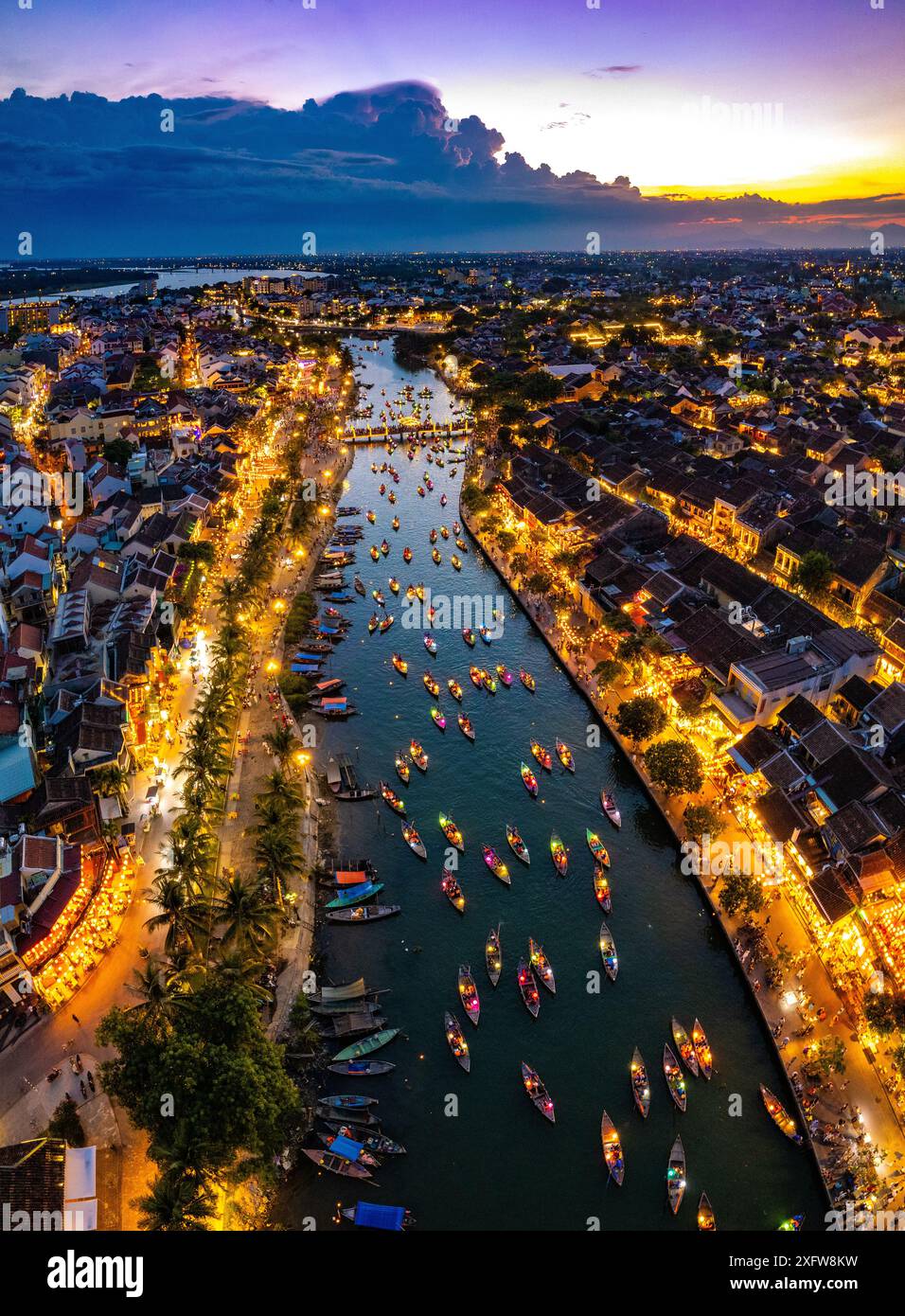 Aerial view of Hoi An Ancient Town with lantern boats on Hoai river, in ...