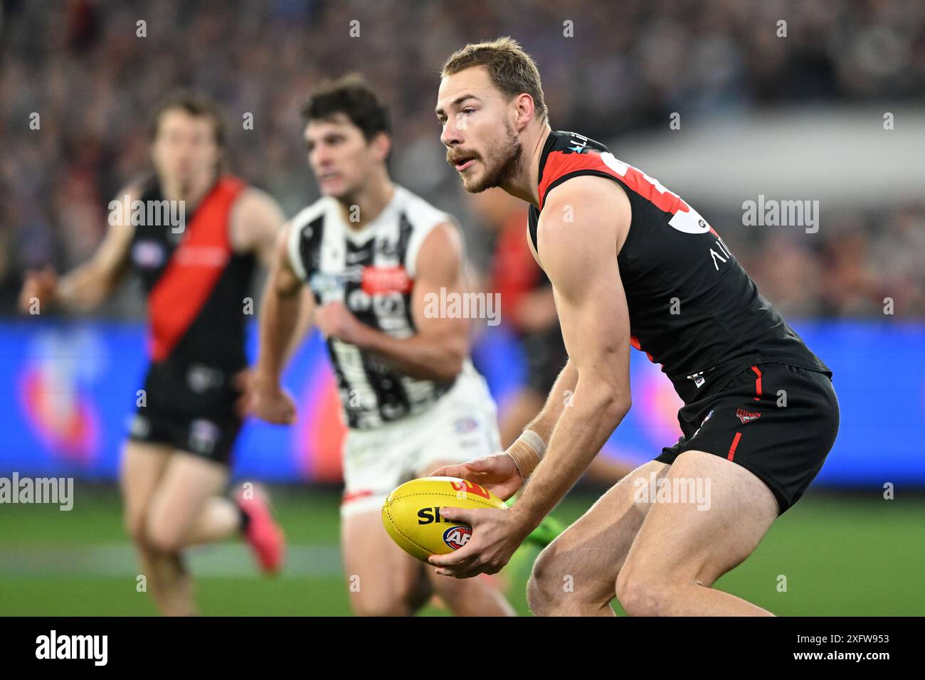 Melbourne, Australia. 05th July, 2024. Ben Mckay of Essendon (right) in ...