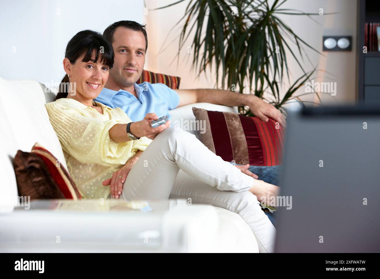 Sitting coach sofa smile hi-res stock photography and images - Alamy