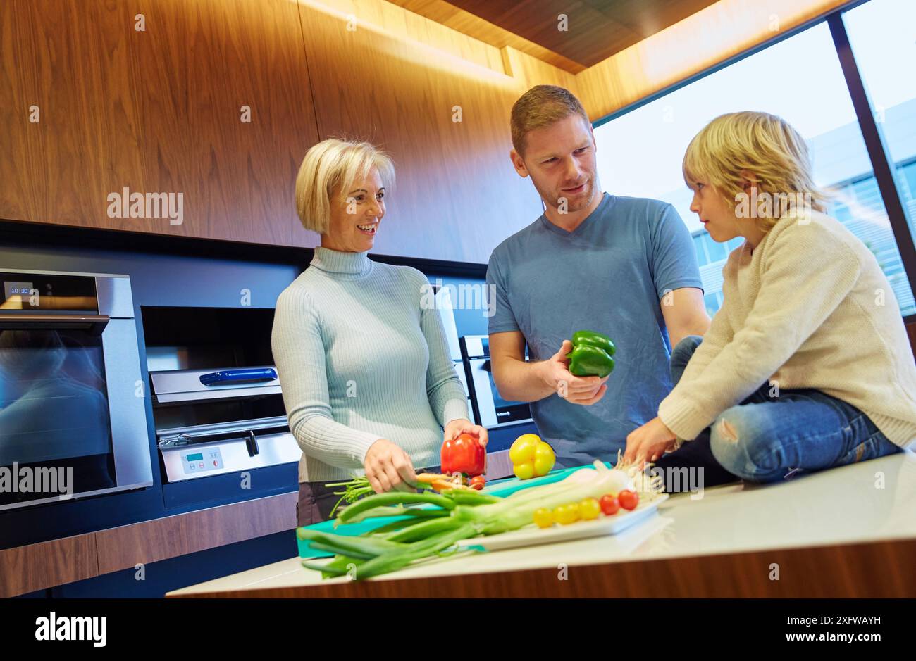 Family in the kitchen. Three generations. Healthy eating. Healthy ...