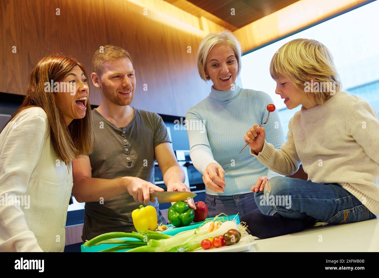 Family in the kitchen. Three generations. Healthy eating. Healthy ...
