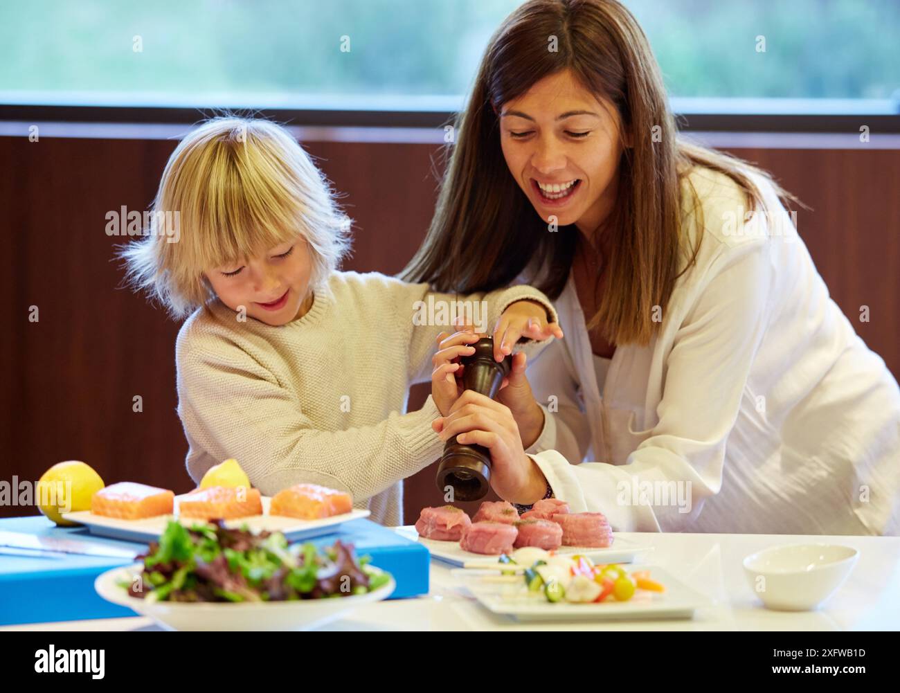 Family in the kitchen. Mother and son. Healthy eating. Healthy growth ...