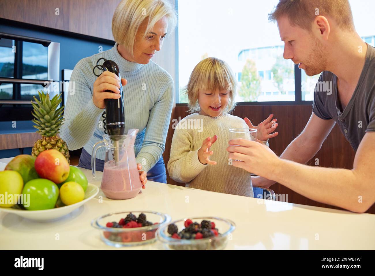 Family in the kitchen. Three generations. Healthy eating. Healthy ...