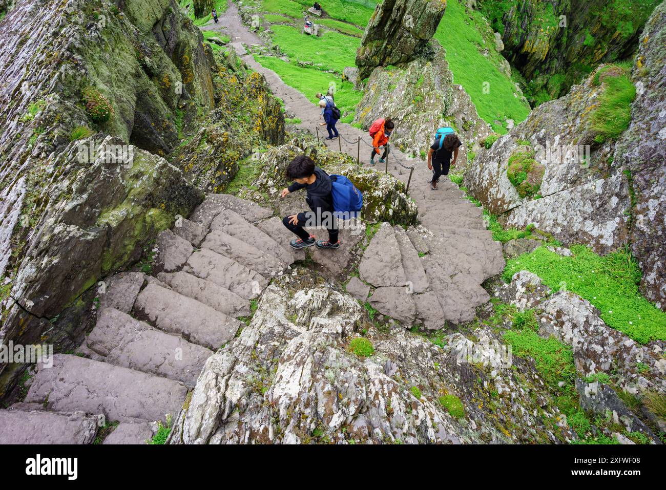 visitors on the steep path up to the monastery, Skellig Michael island ...